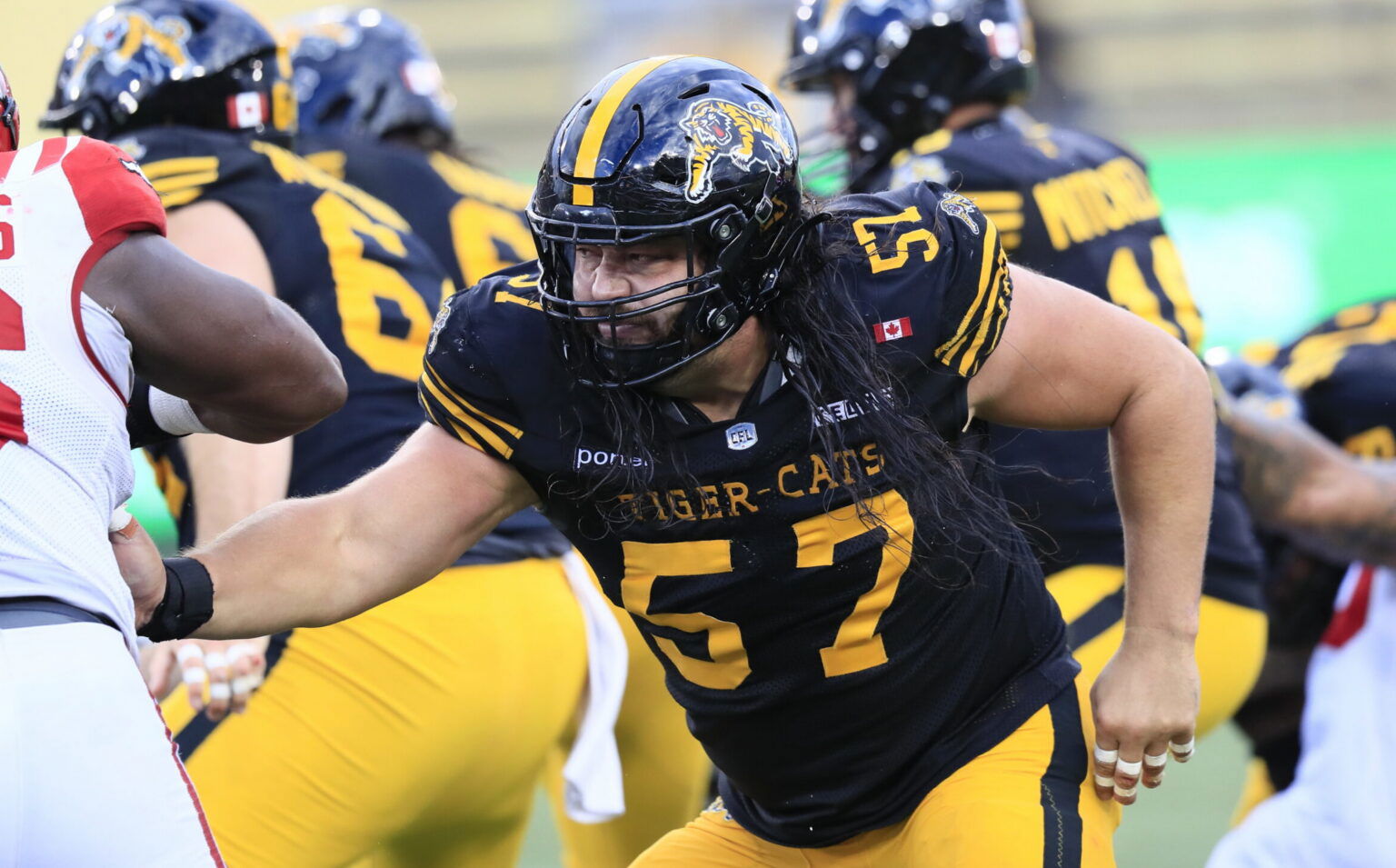 Hamilton Tiger-Cats lock up All-CFL offensive lineman Brandon Revenberg ...